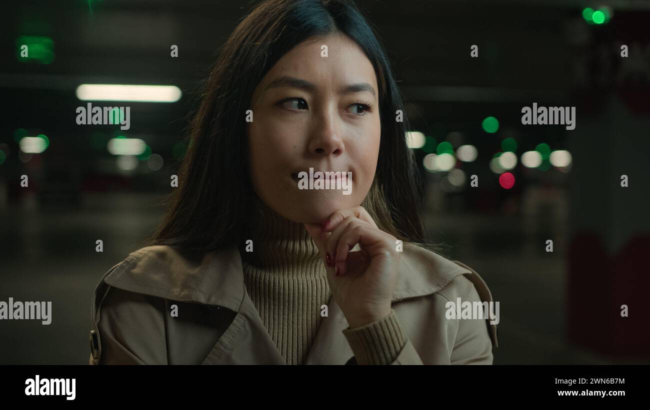 Close up thoughtful doubtful Asian woman ethnic chinese japanese girl ...