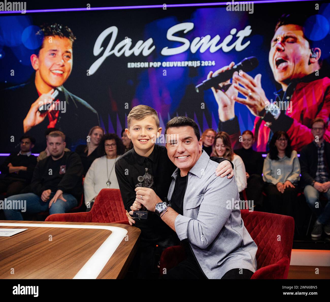 AMSTERDAM - Jan Smit receives an Edison Pop Oeuvre Prize from his son ...