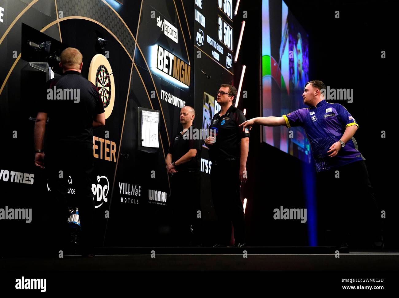 Luke Littler in action during his match against Rob Cross on night five ...