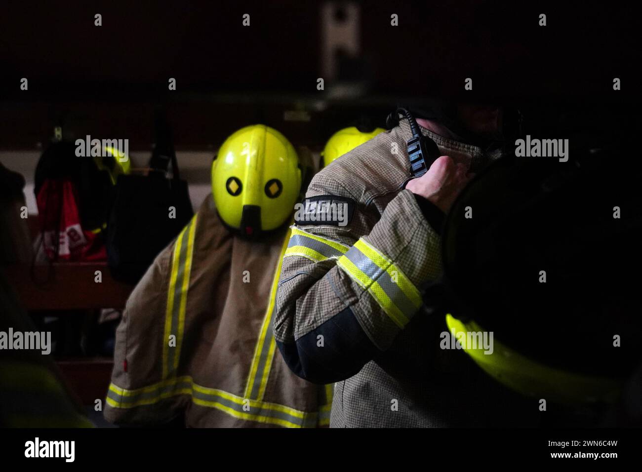 Firefighter officers run through a practice drill during a London Fire ...