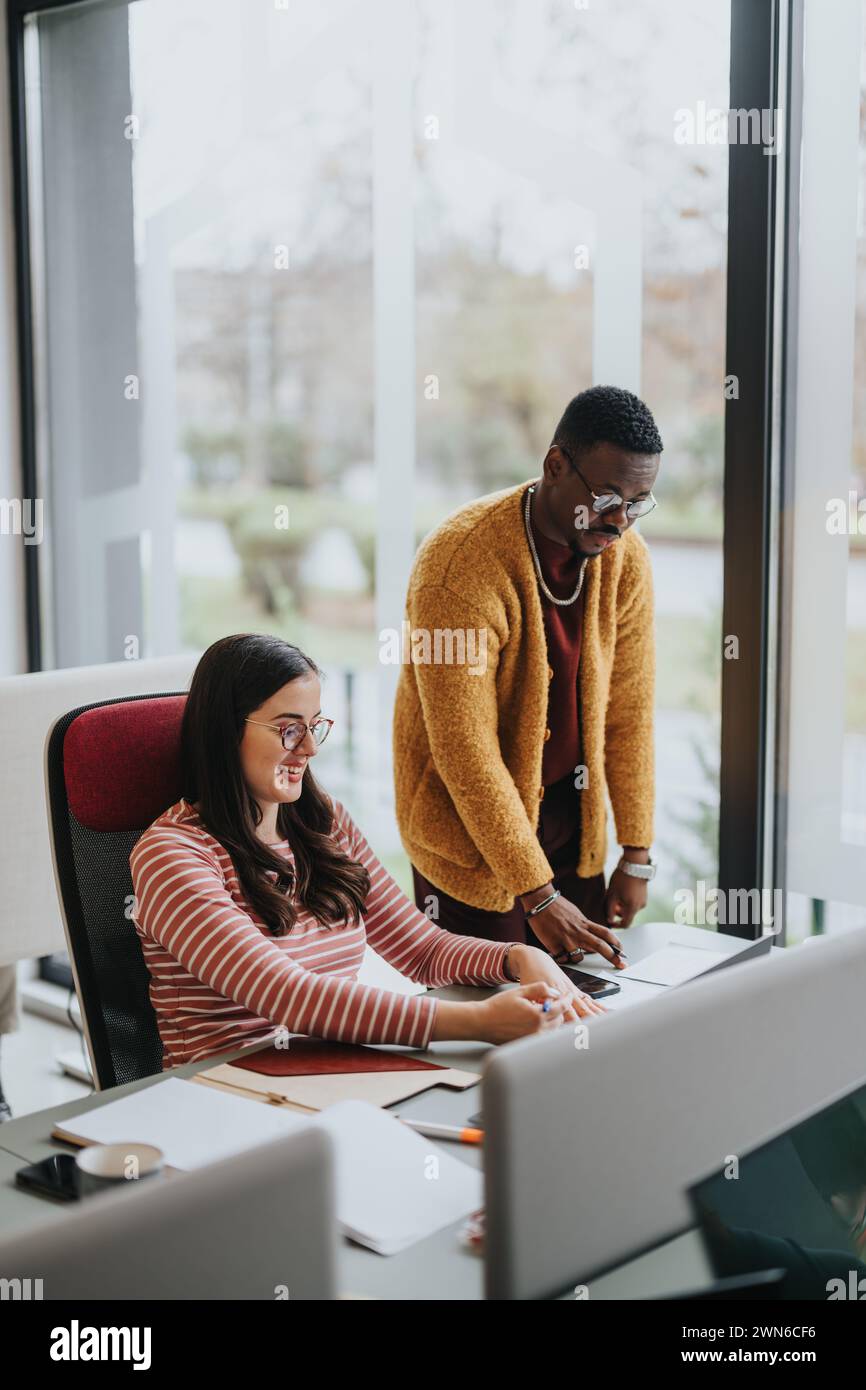 Woman man are collaborating office environment hi-res stock photography ...
