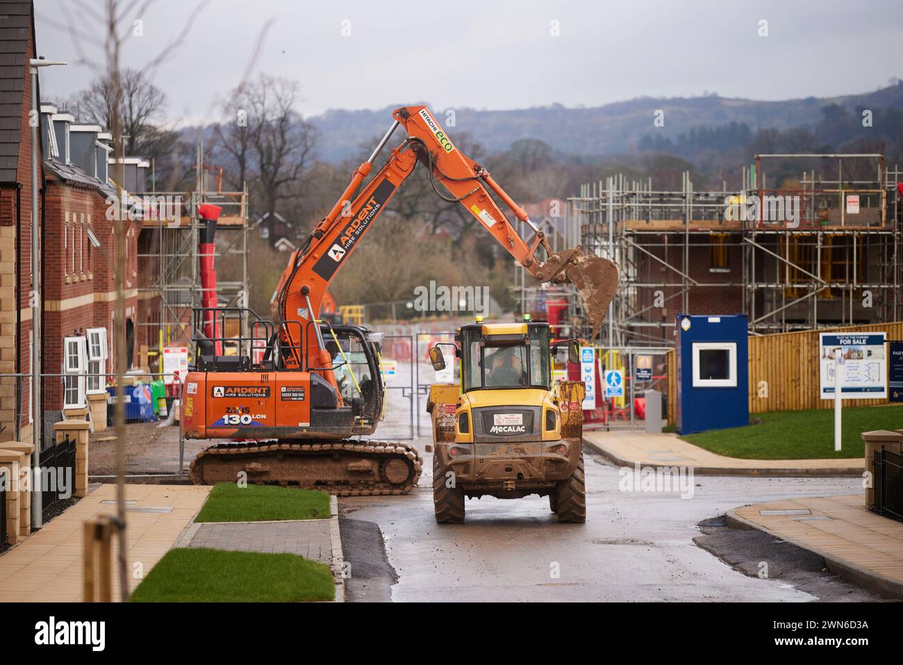 New build housing development in Cheshire, a digger and dumper truck ...