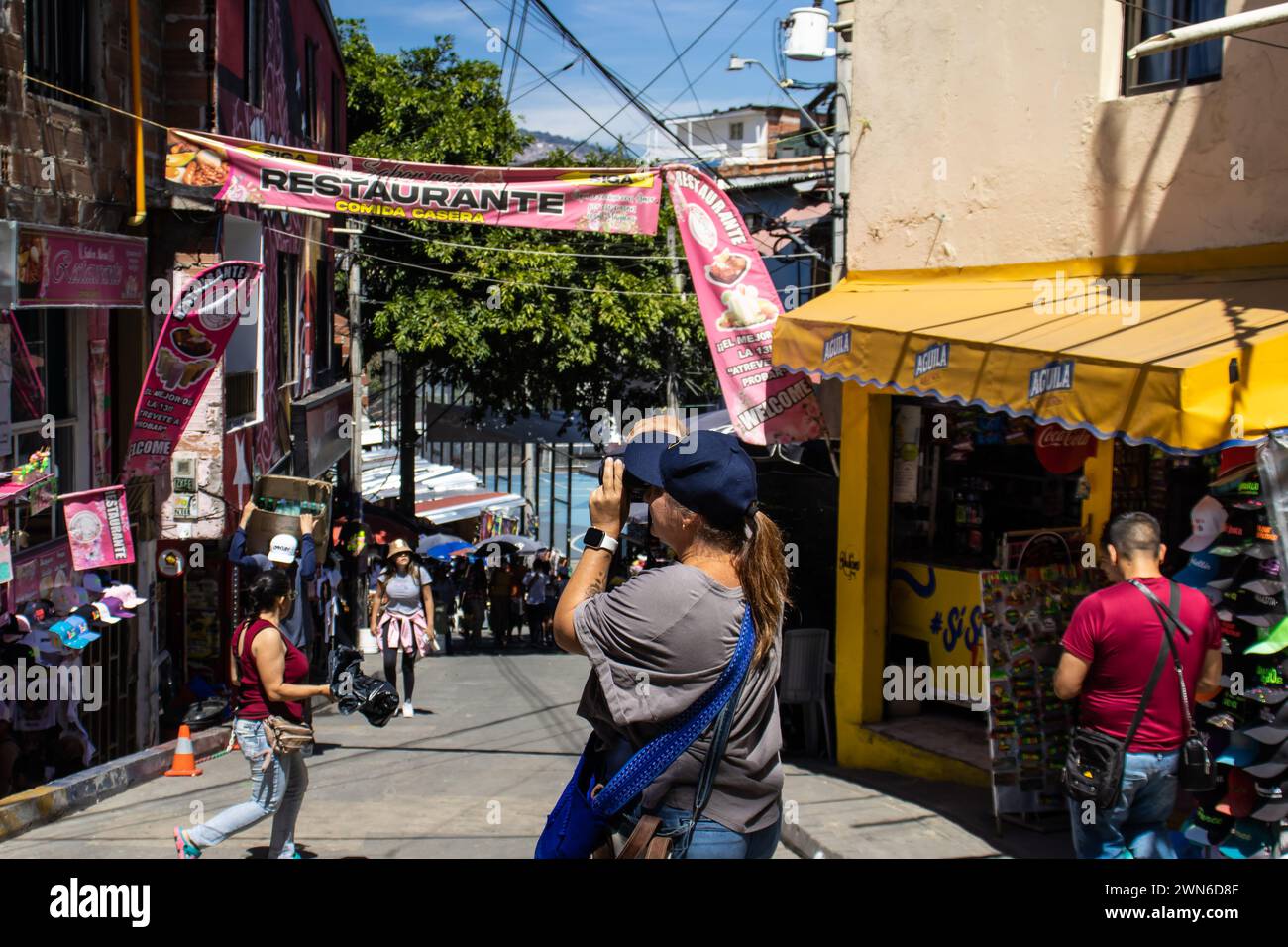 MEDELLIN, COLOMBIA - JANUARY 17, 2024: Female tourist taking pictures ...