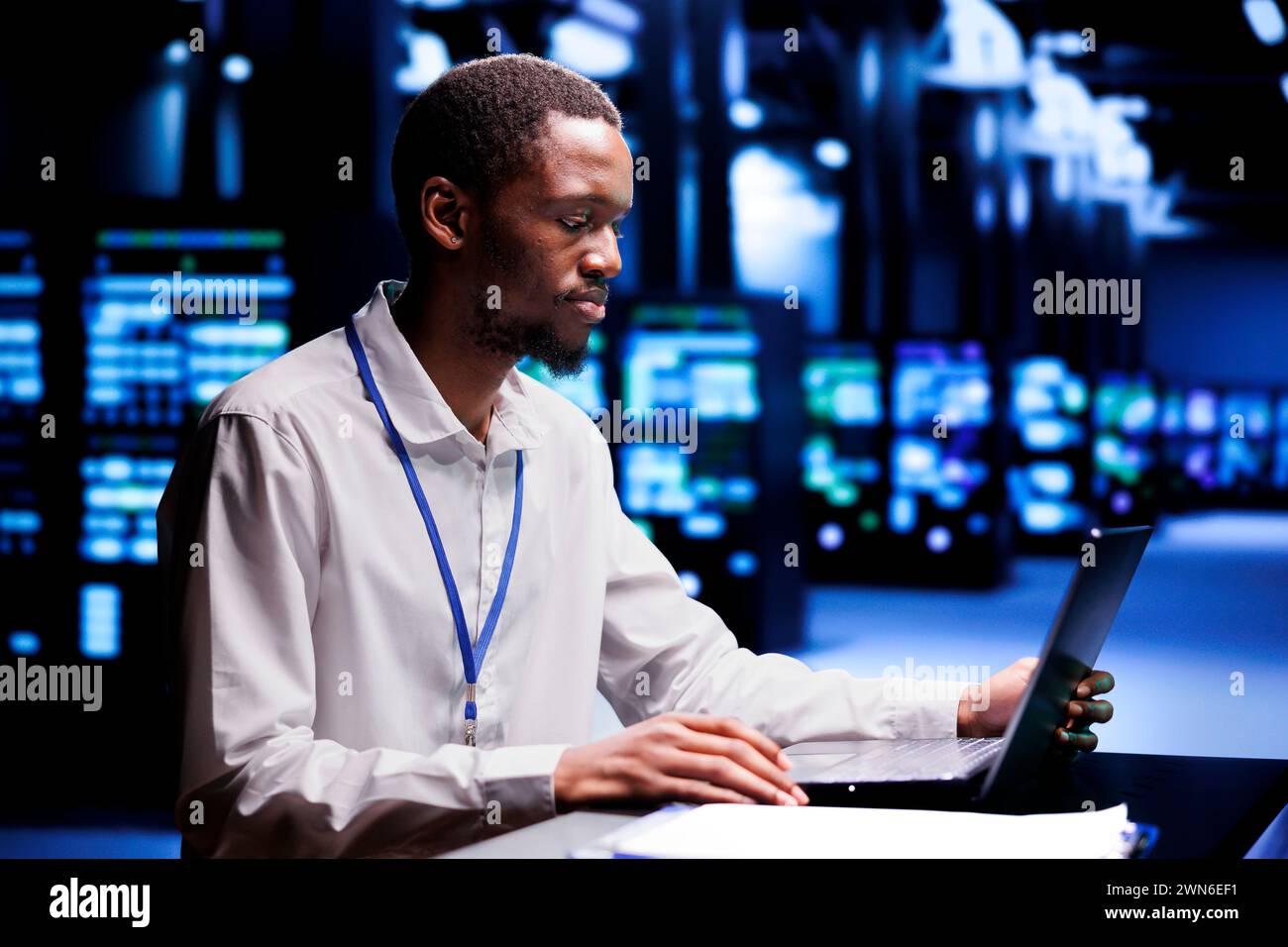 Technician ordering servers racks with high availability features to ...