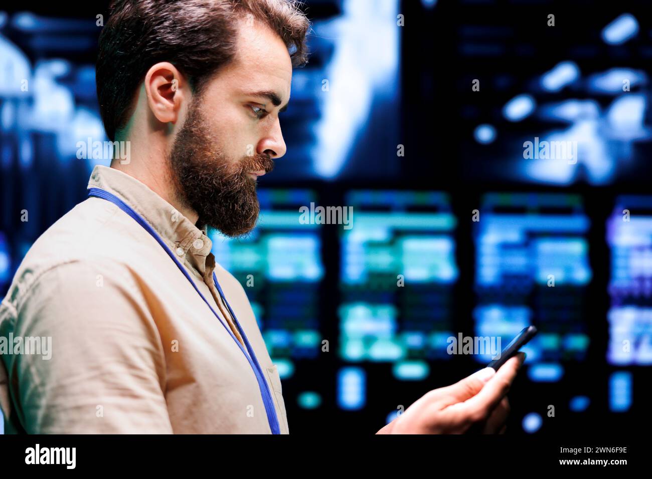 Expert Using Tablet To Set Up Supercomputer Farm Infrastructure