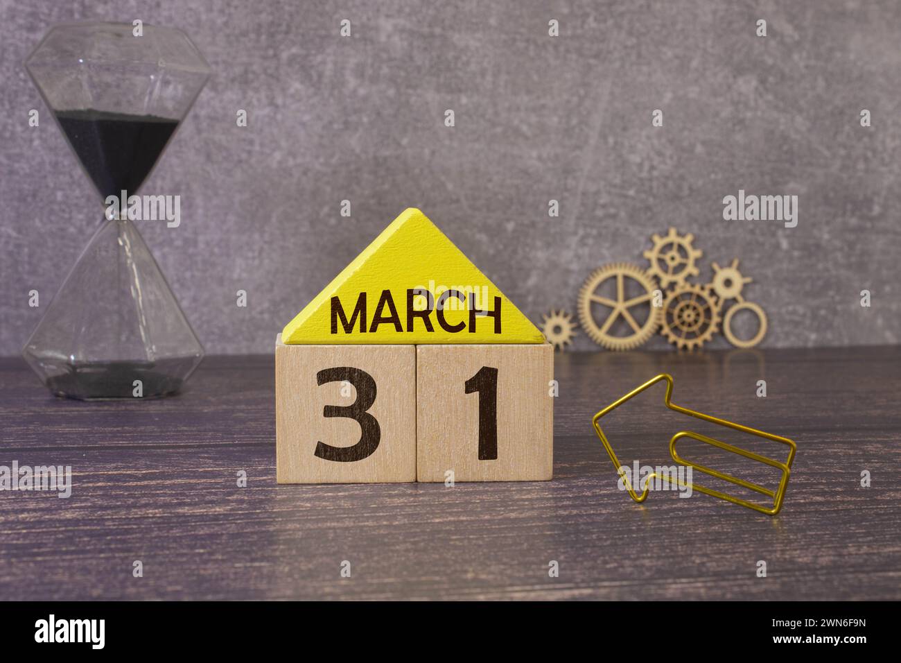 March 31st. Image of march 31 wooden color calendar on white brick wall ...