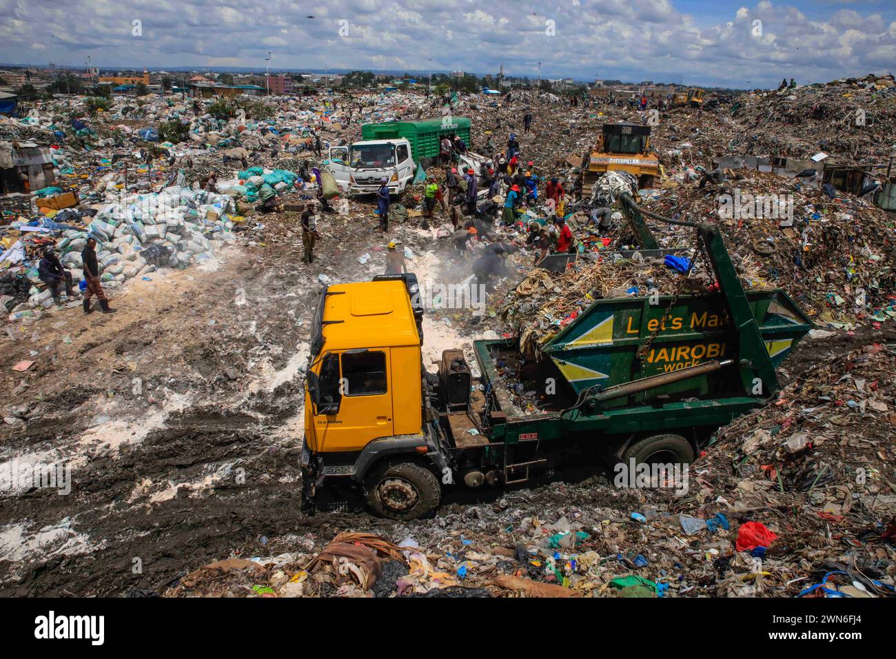 Nairobi, KENYA. 28th Feb, 2024. Waste collectors offloading waste ...