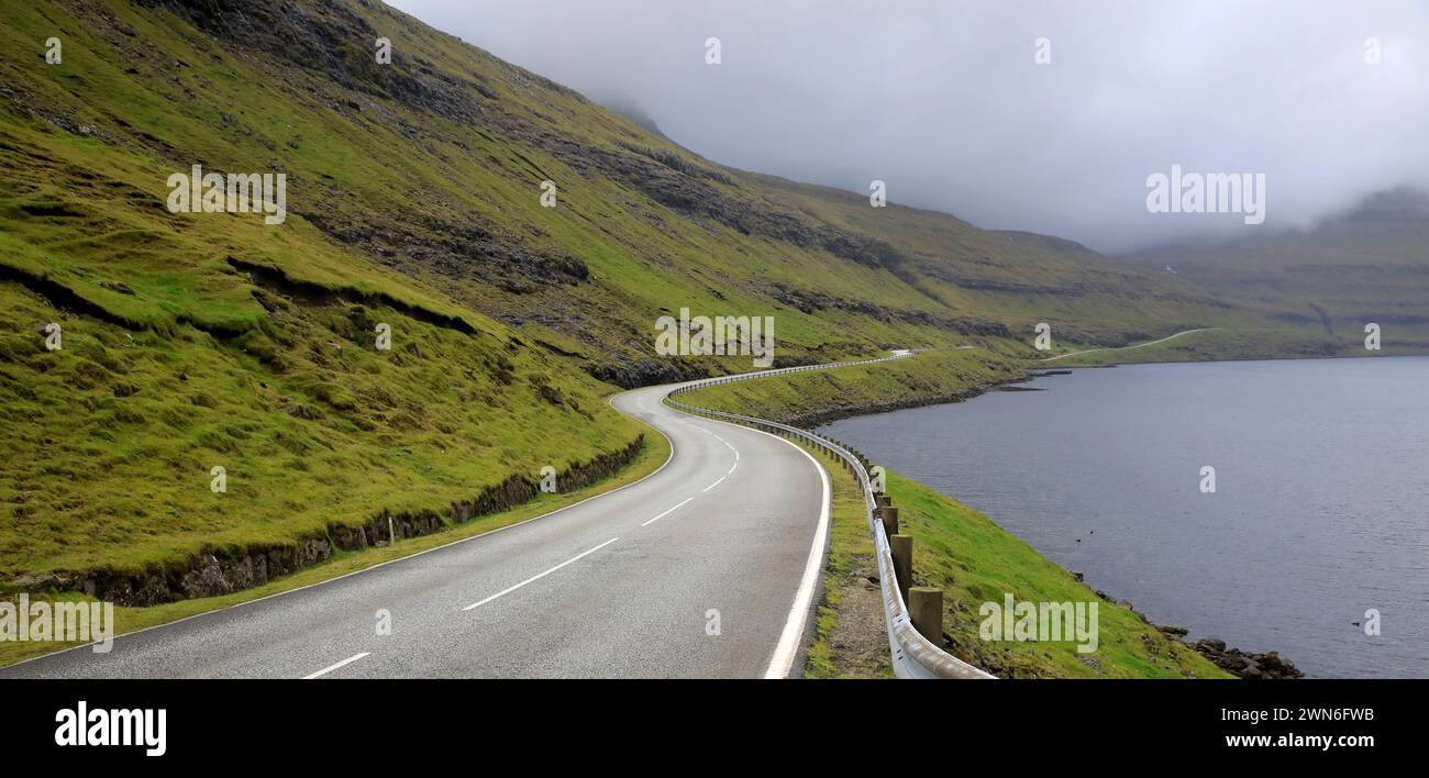 Empty asphalt road near sea hi-res stock photography and images - Alamy