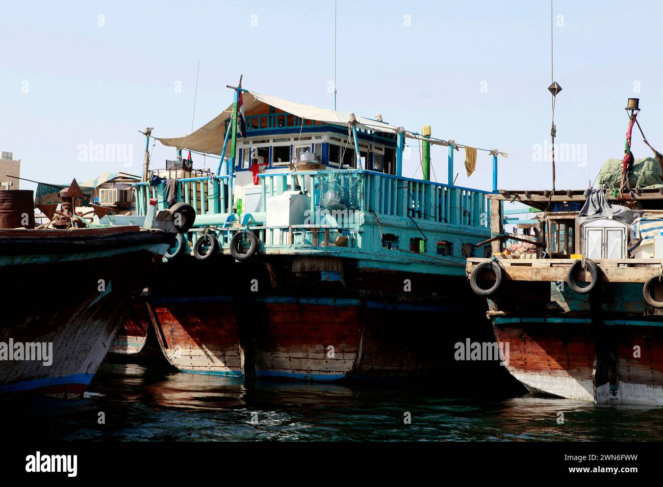 Traditional arabic wooden dhow at Dubai Creek. United Arab Emirates ...