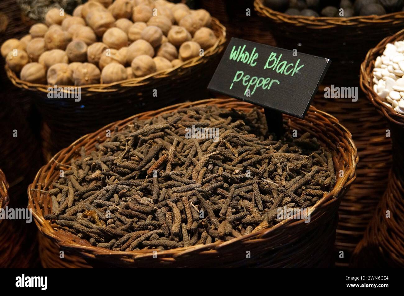 whole black pepper for sale on the arab street market stall. Dubai ...