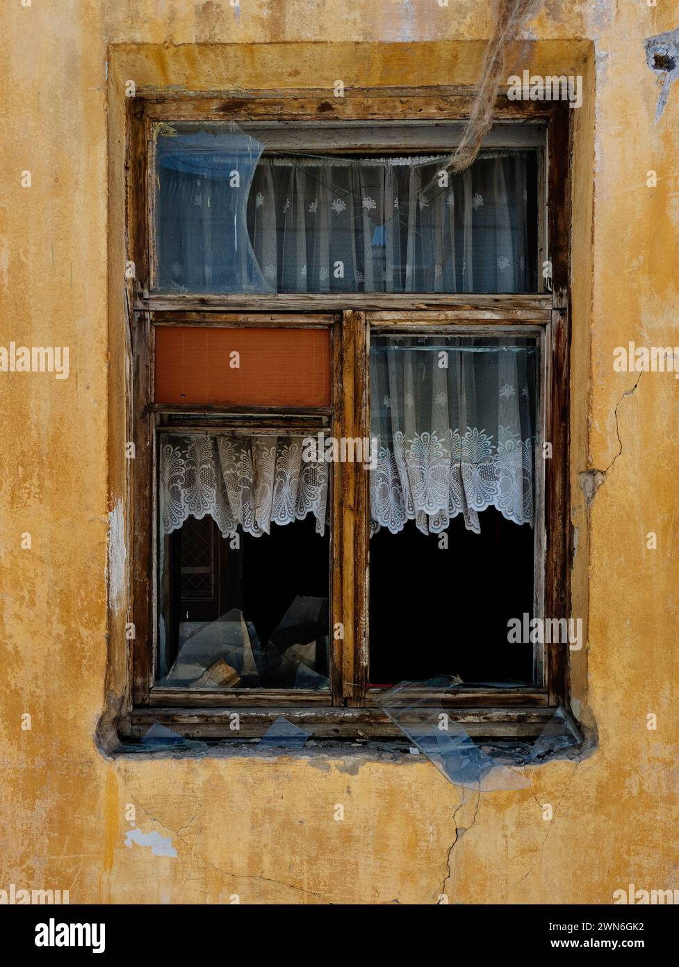 Broken window of residential building Stock Photo - Alamy