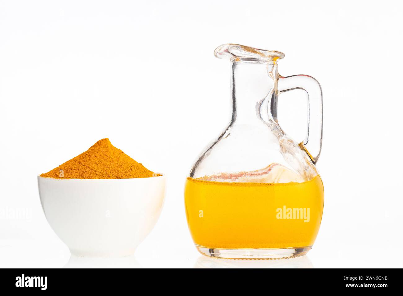 Mixture of water with turmeric powder - Curcuma longa tea Stock Photo ...