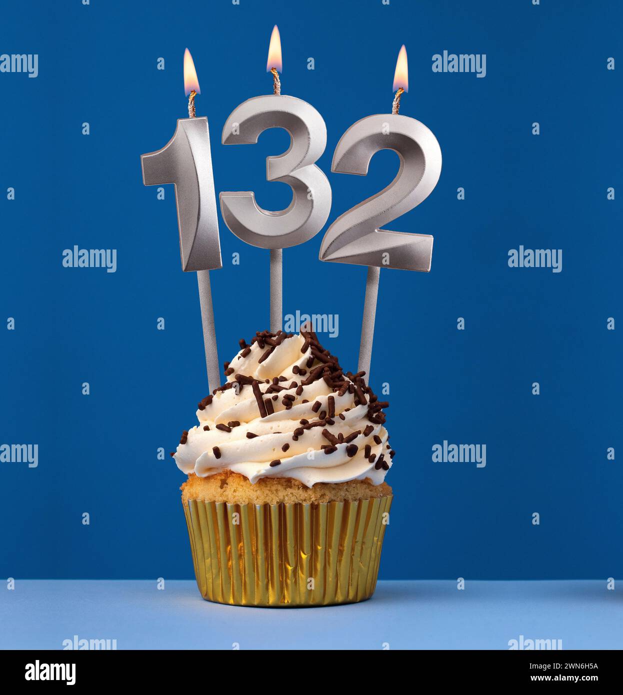 Vertical birthday card with cupcake - Lit candle number 132 on blue ...