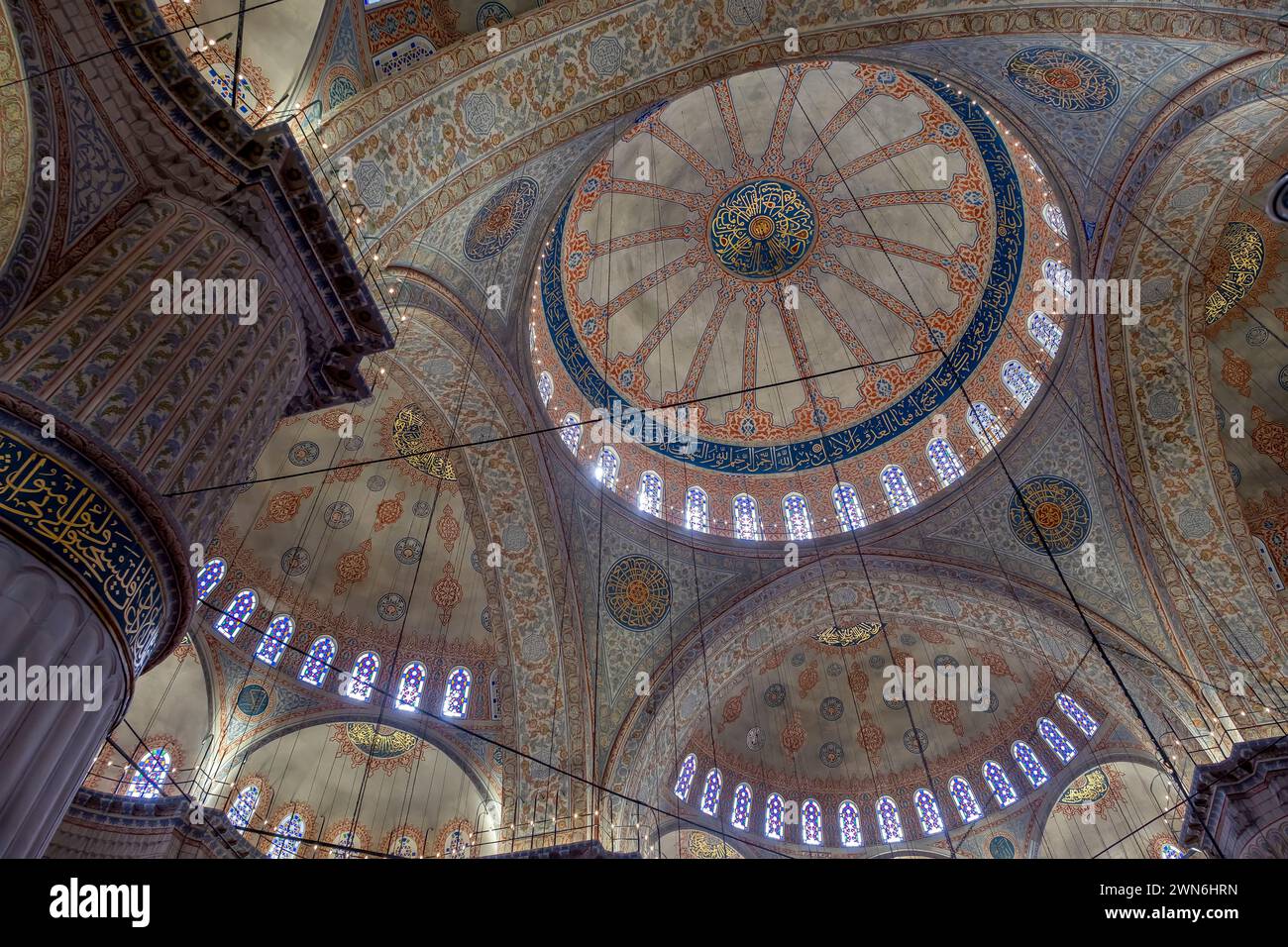 interior of the blue mosque in istanbul, with its colorful stained ...