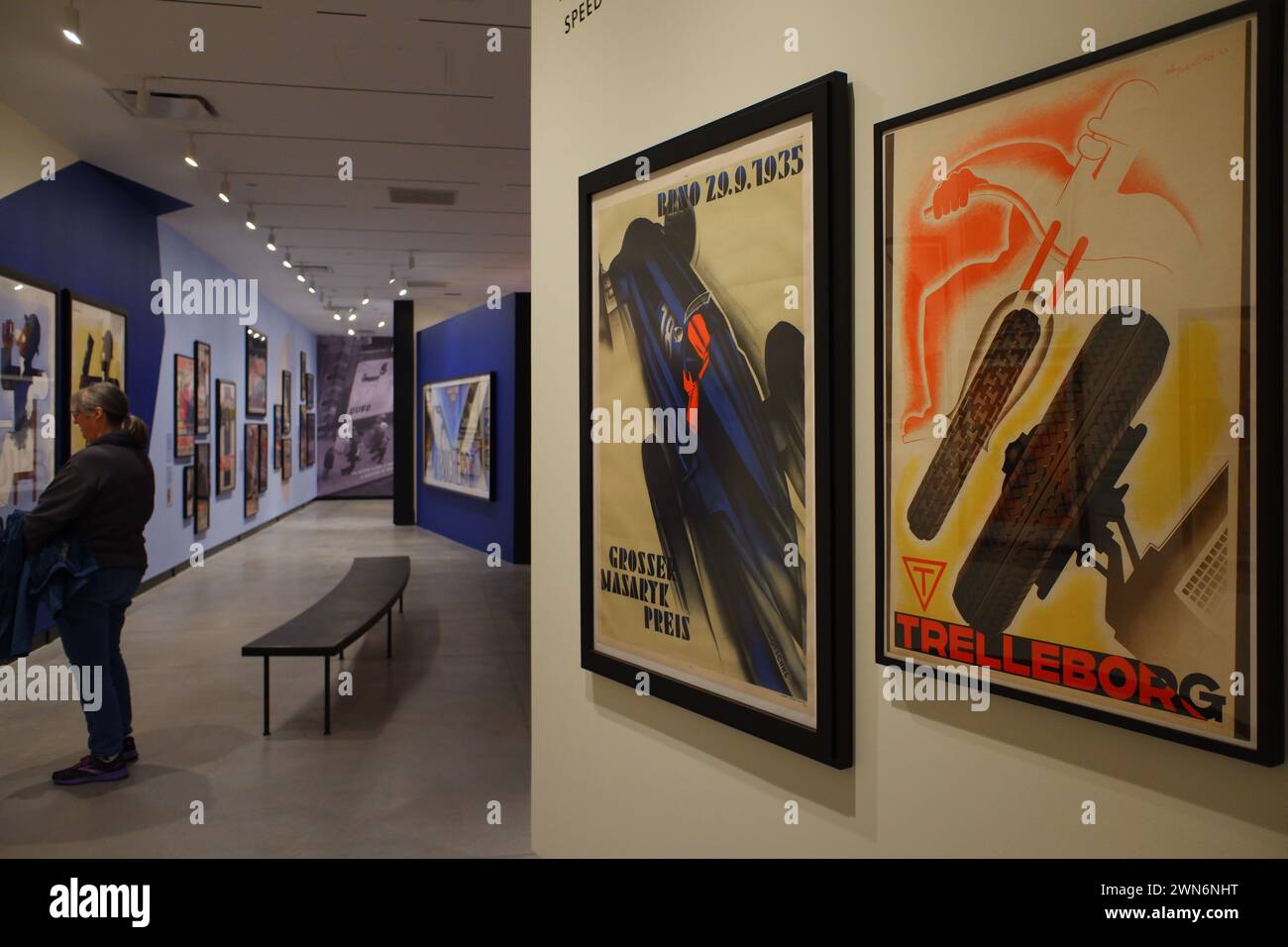 A visitor in Poster House Museum with the Art Deco posters of Walter ...