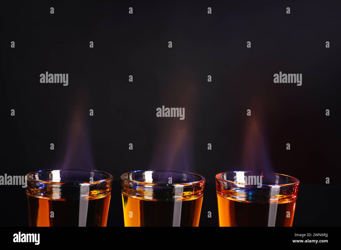 Glasses burning alcohol on hi-res stock photography and images - Alamy