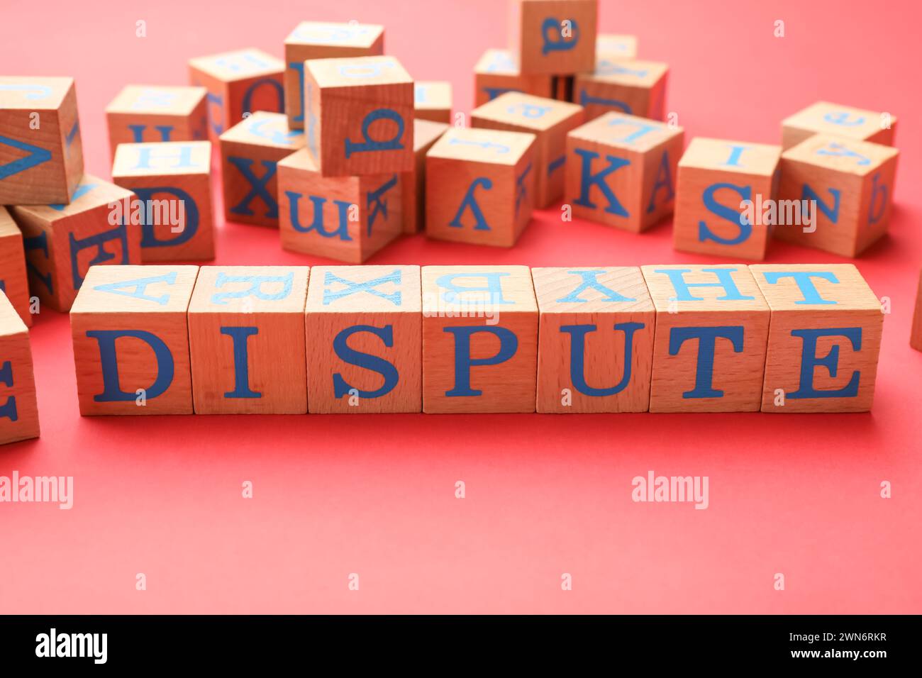 Cubes with word Dispute on color background Stock Photo - Alamy