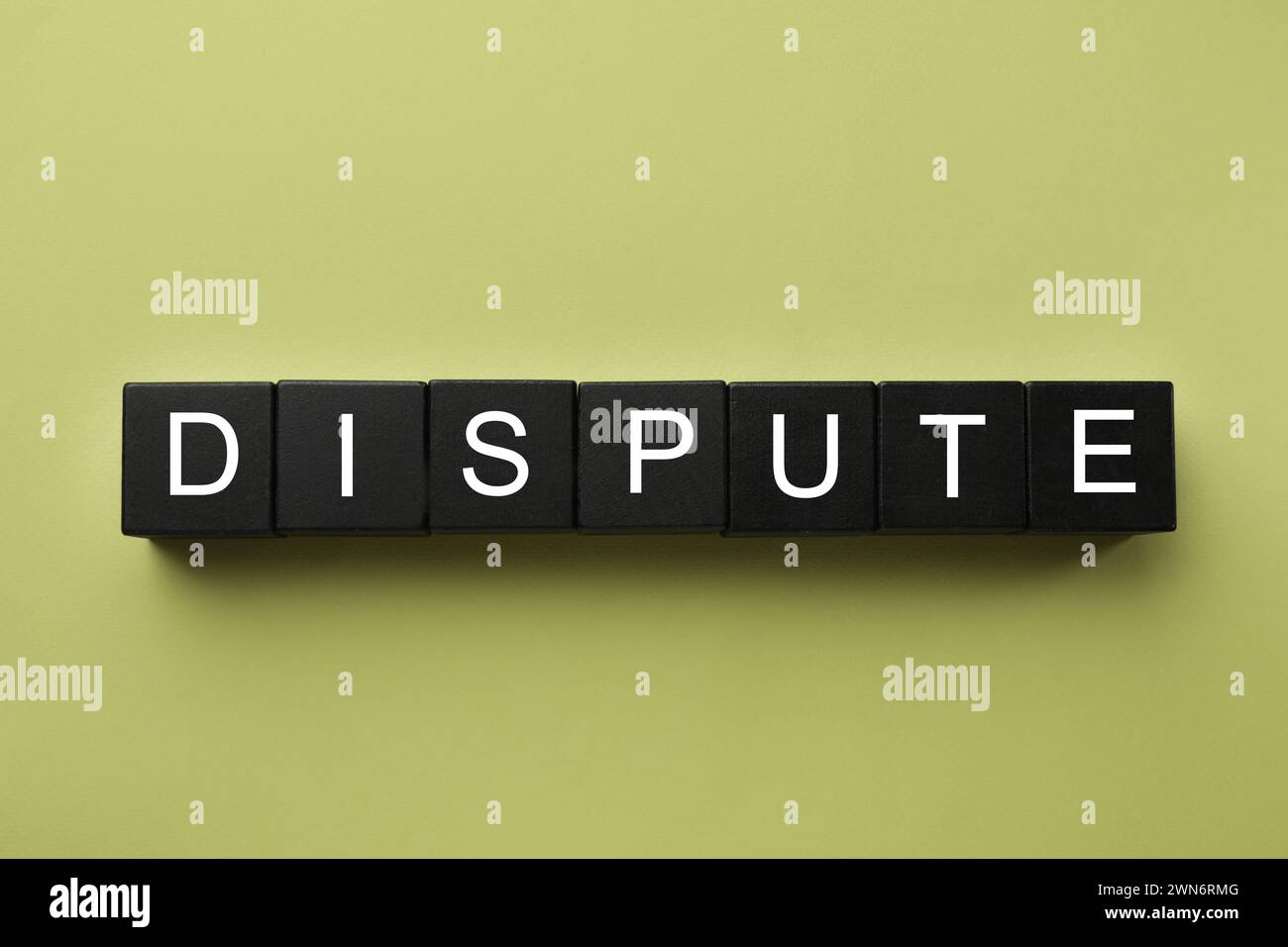 Black cubes with word Dispute on light green background, top view Stock ...