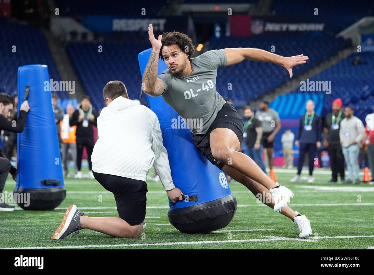 Washington defensive lineman Bralen Trice runs a drill at the NFL ...