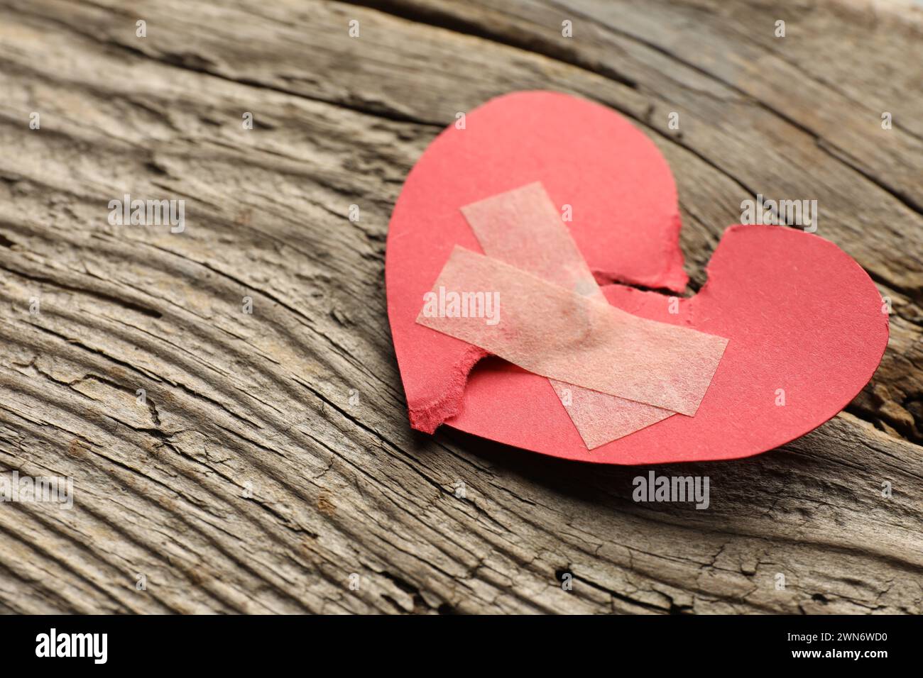 Broken heart bandages hi-res stock photography and images - Alamy