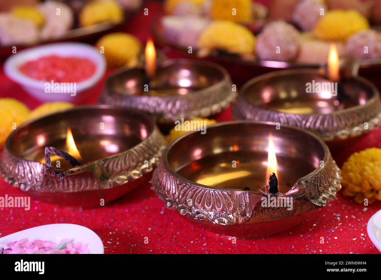 Diya lamps on red hi-res stock photography and images - Alamy