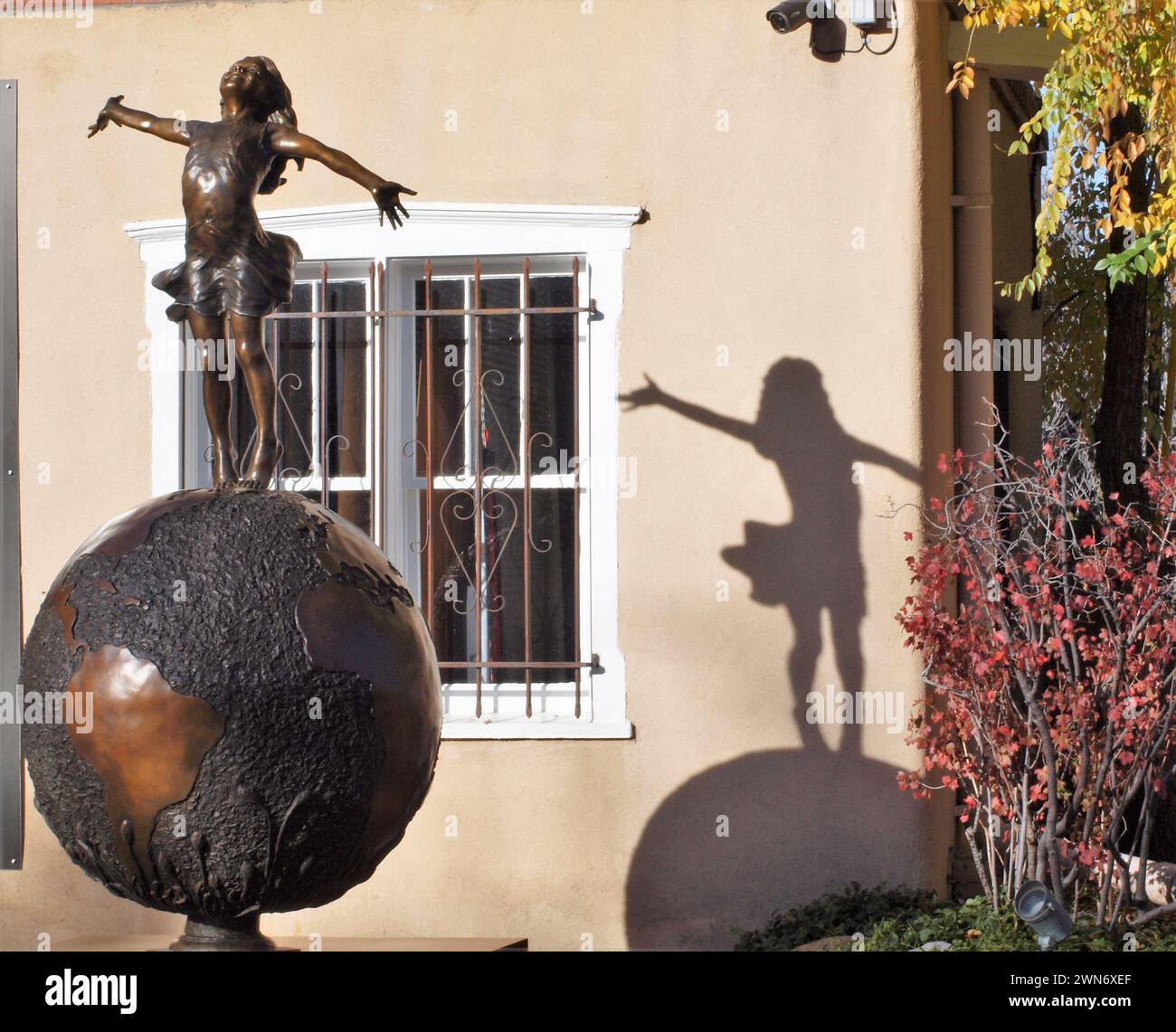 Statue and girls shadow at a gallery window Stock Photo - Alamy