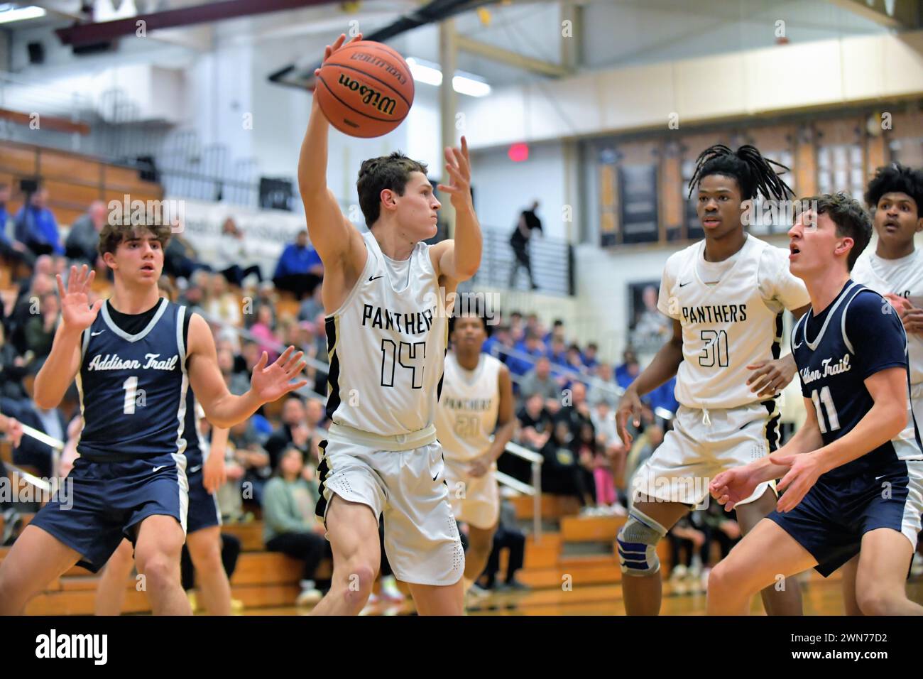 Illinois, USA. After controling a loose ball of a rebound, a player ...