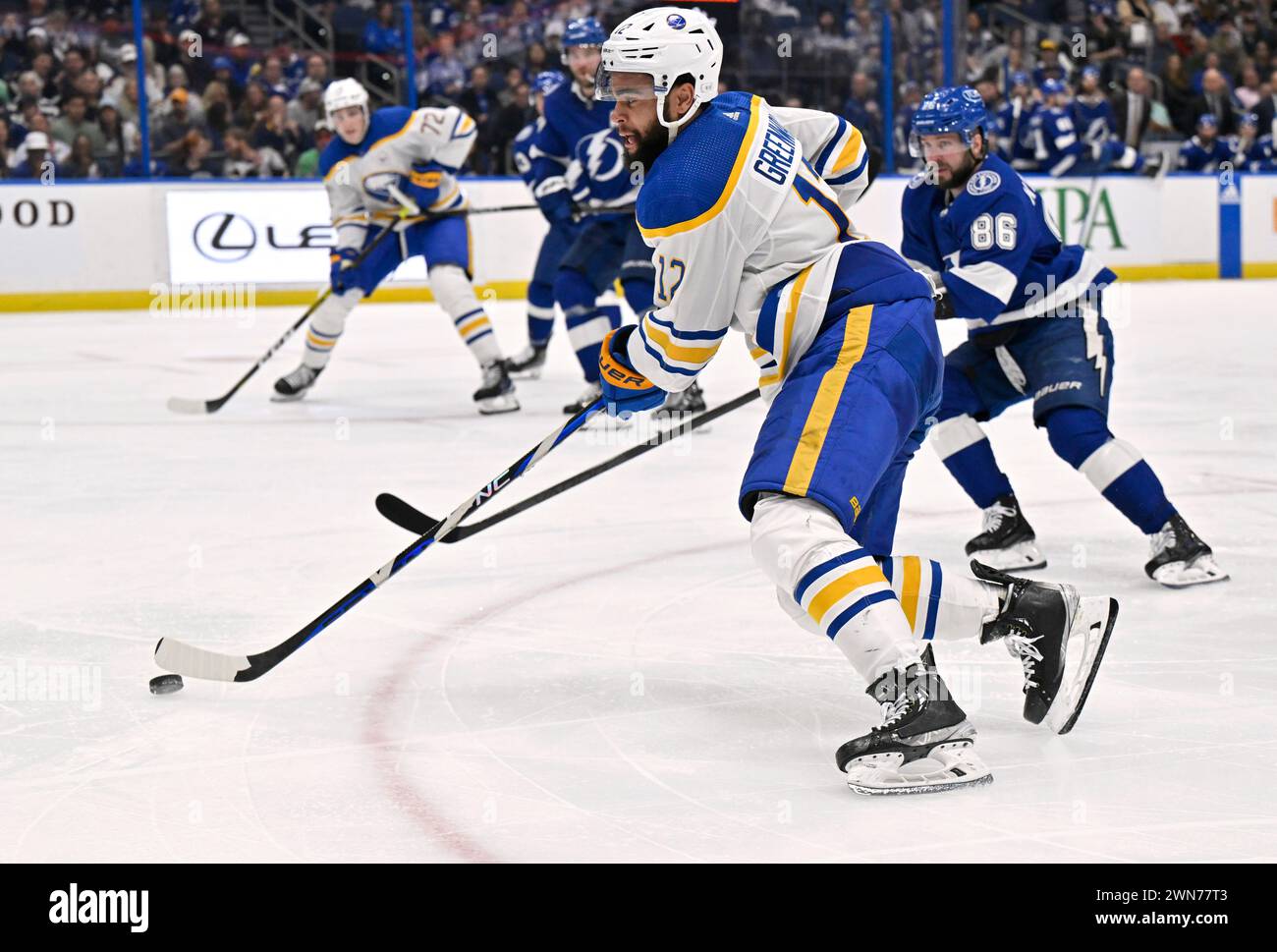 Buffalo Sabres left wing Jordan Greenway (12) handles the puck during ...