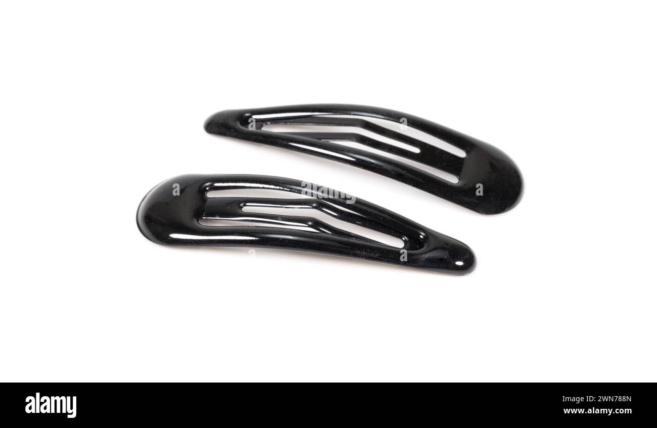 Black hair clips on isolated white background Stock Photo - Alamy