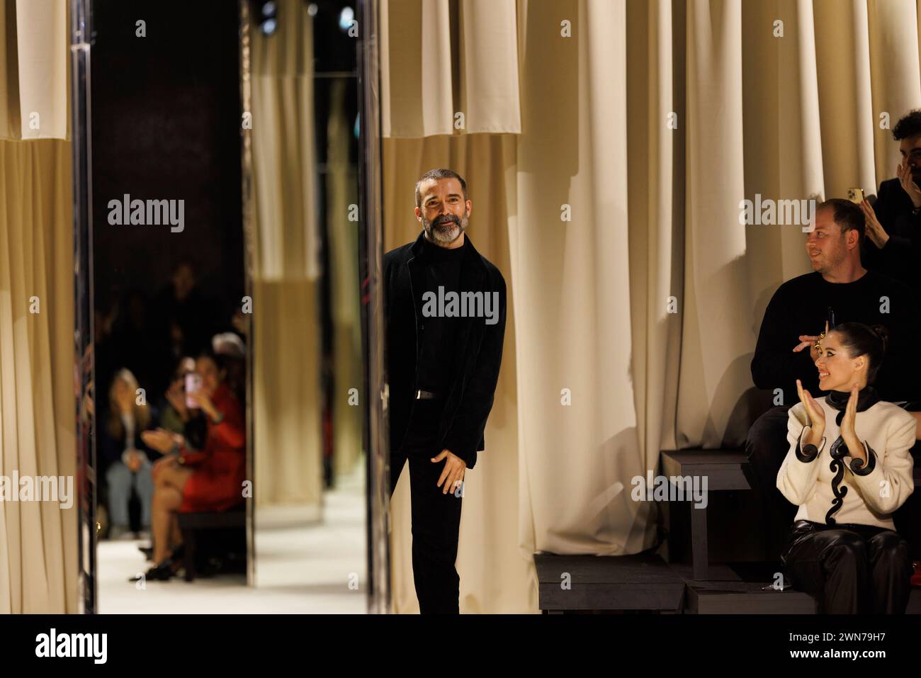Designer Daniel Roseberry accepts applause at the conclusion of the ...