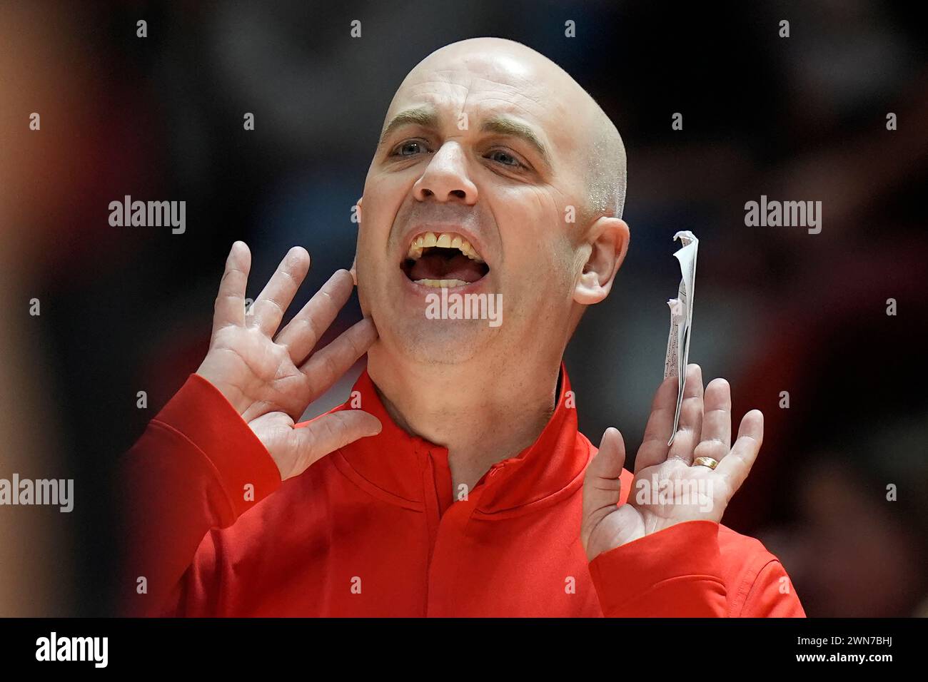 Utah head coach Craig Smith shouts during the second half of the team's ...