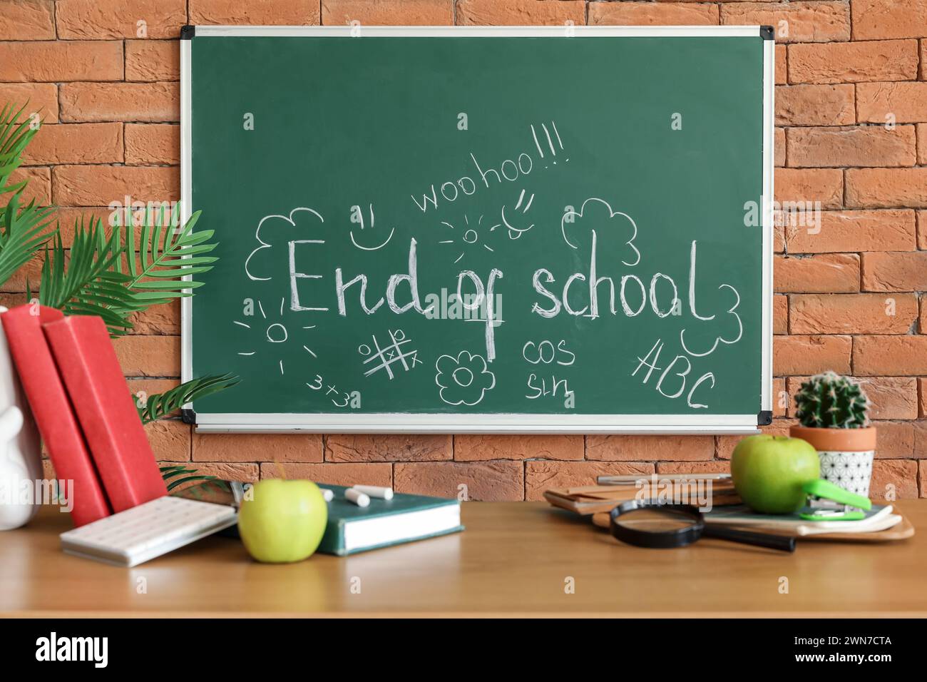 Blackboard with text END OF SCHOOL and drawings in classroom Stock ...