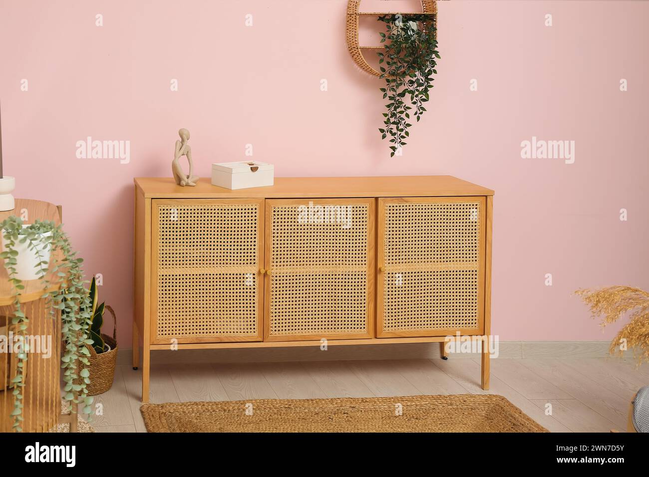 Interior of stylish living room with modern light wooden chest of ...