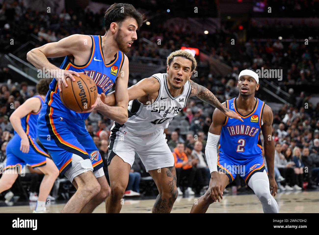 San Antonio Spurs' Jeremy Sochan (10) tangles with Oklahoma City ...