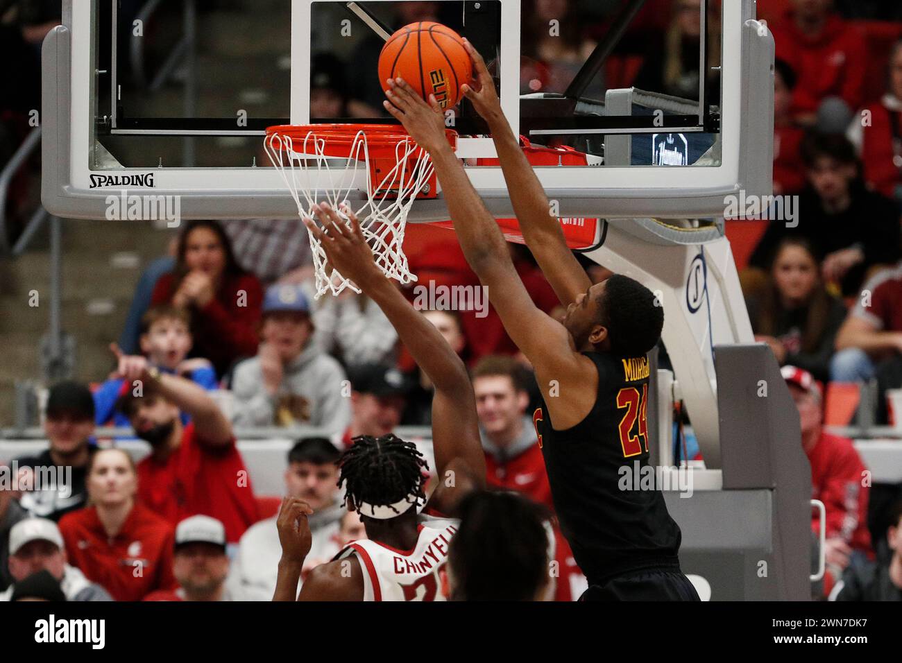 Southern California forward Joshua Morgan (24) dunks while pressured by ...