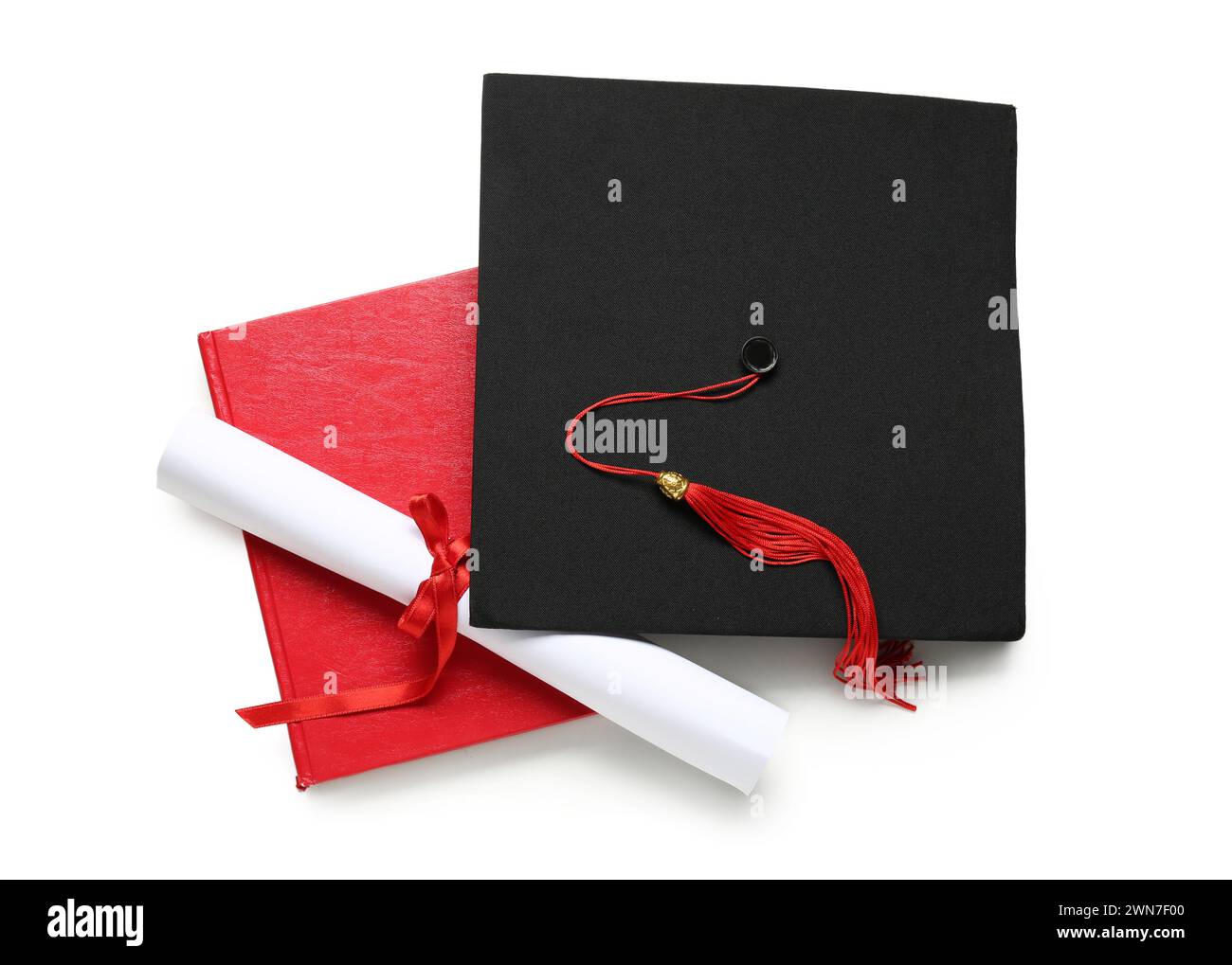 Mortar board with diploma and book on white background Stock Photo - Alamy