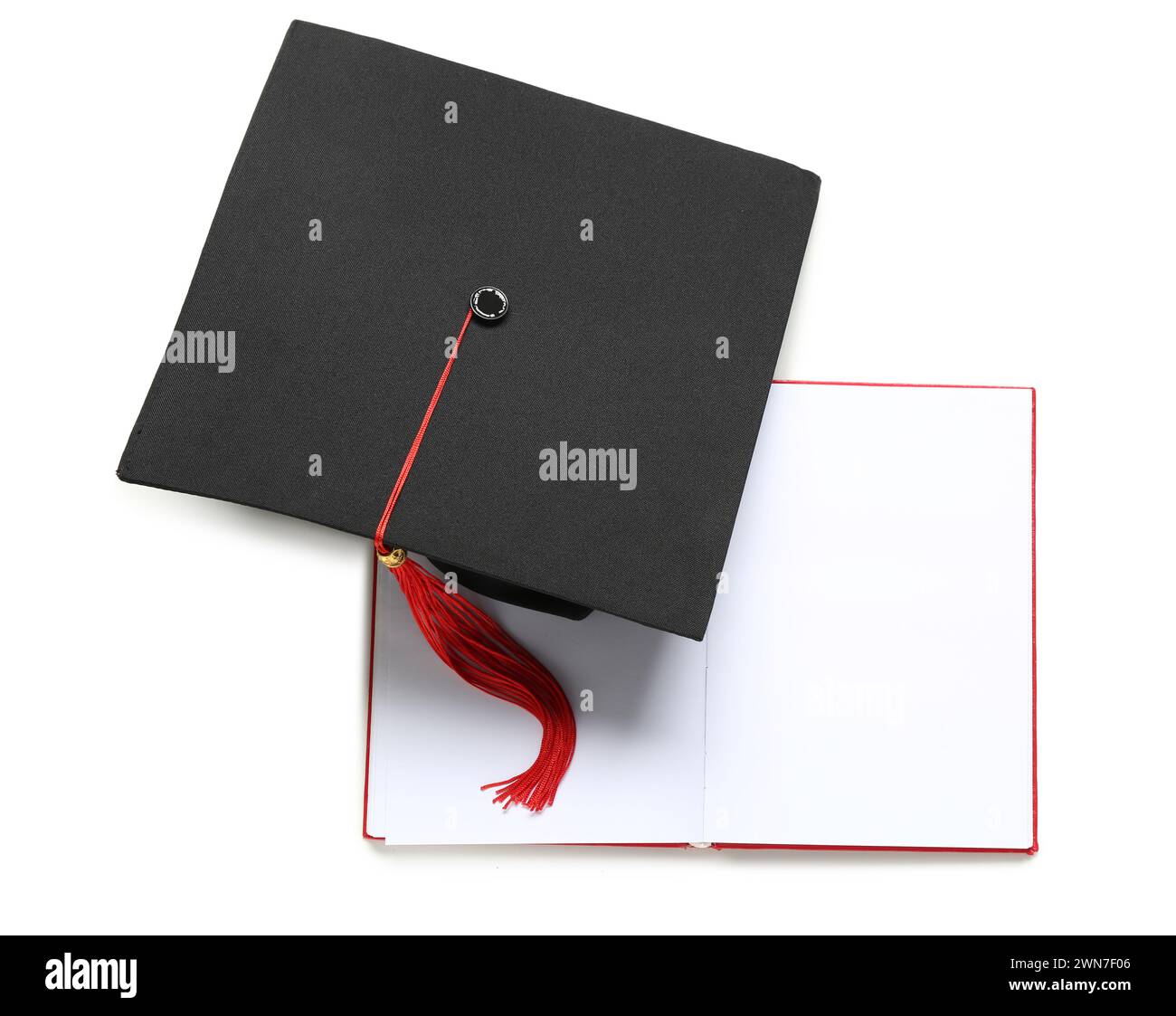 Mortar board and notebook on white background Stock Photo - Alamy
