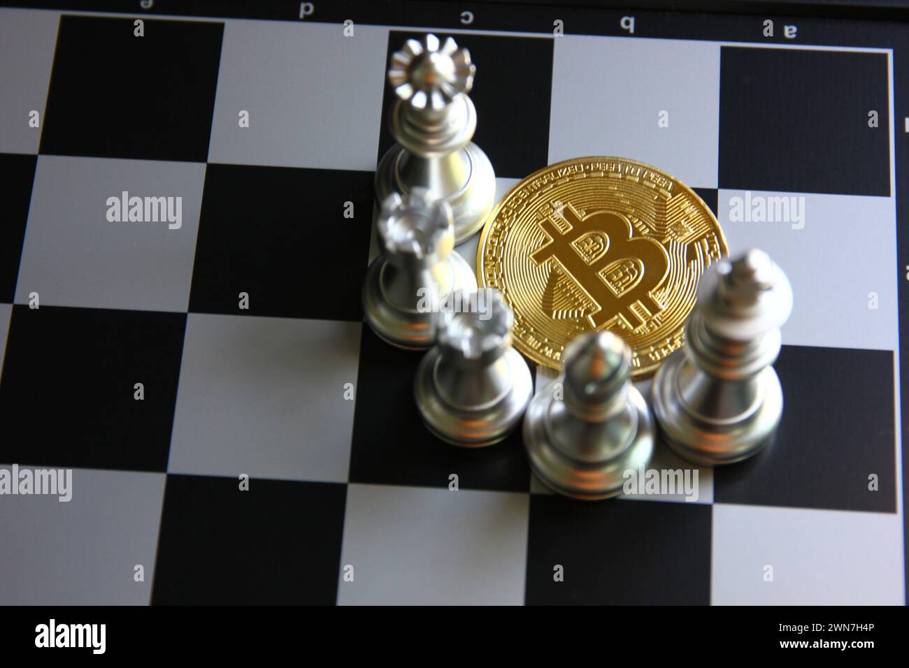 bit coin with silver chess on board , bit coin concept Stock Photo - Alamy