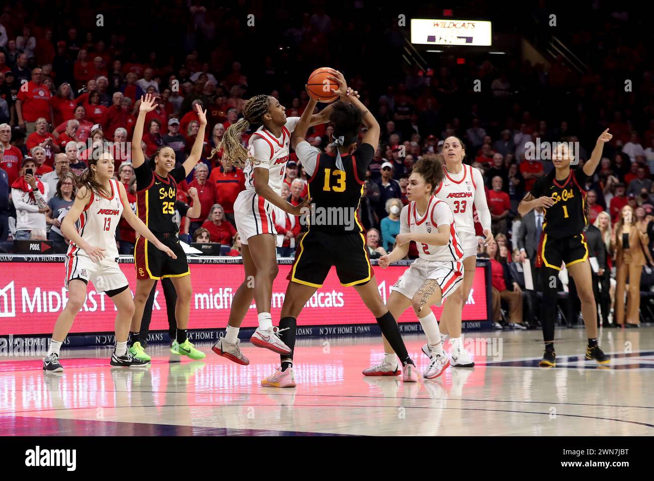 TUCSON, AZ - FEBRUARY 29: Arizona Wildcats guard Skylar Jones #4 fouls ...