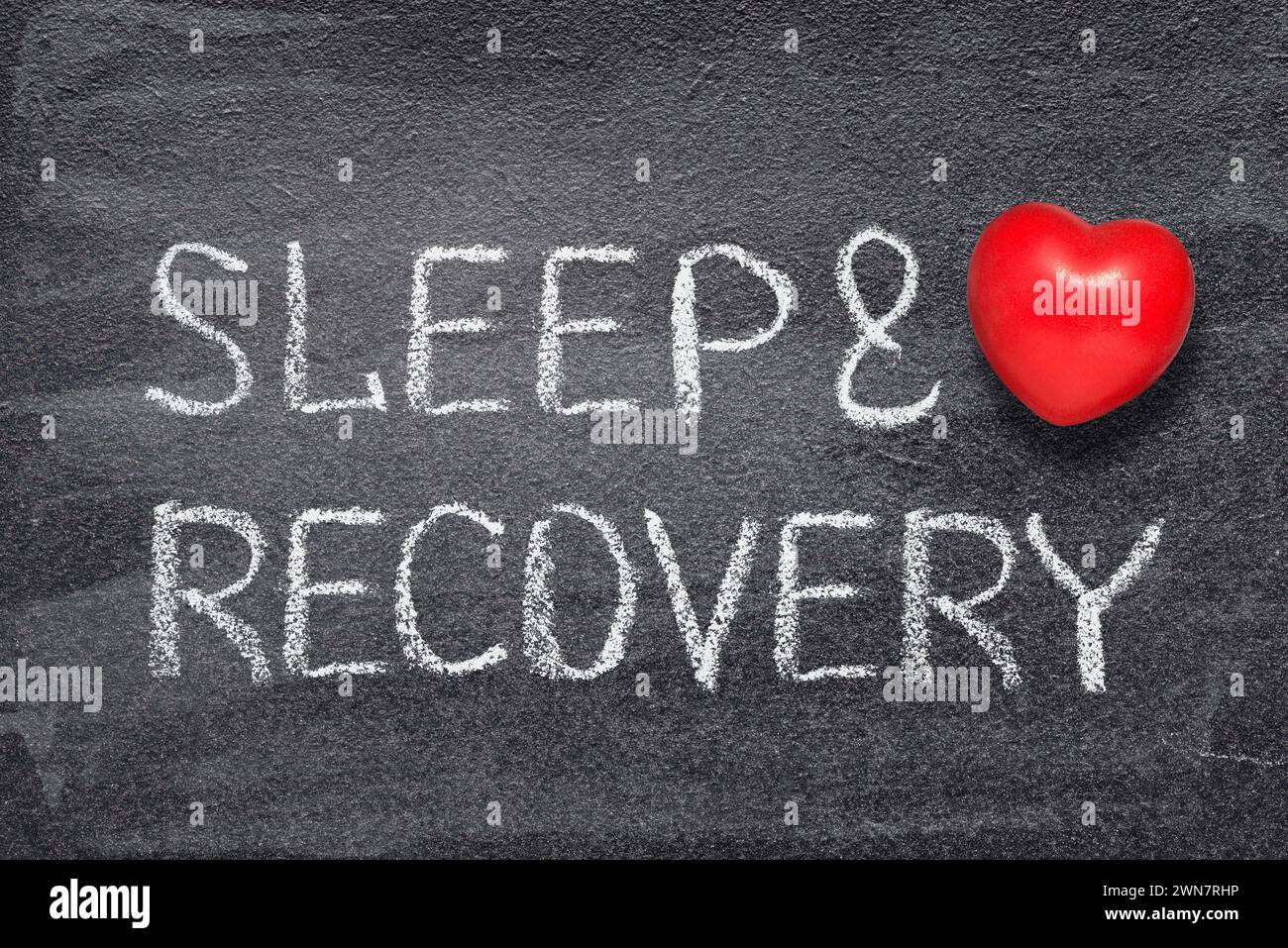 sleep and recovery phrase written on chalkboard with red heart symbol ...