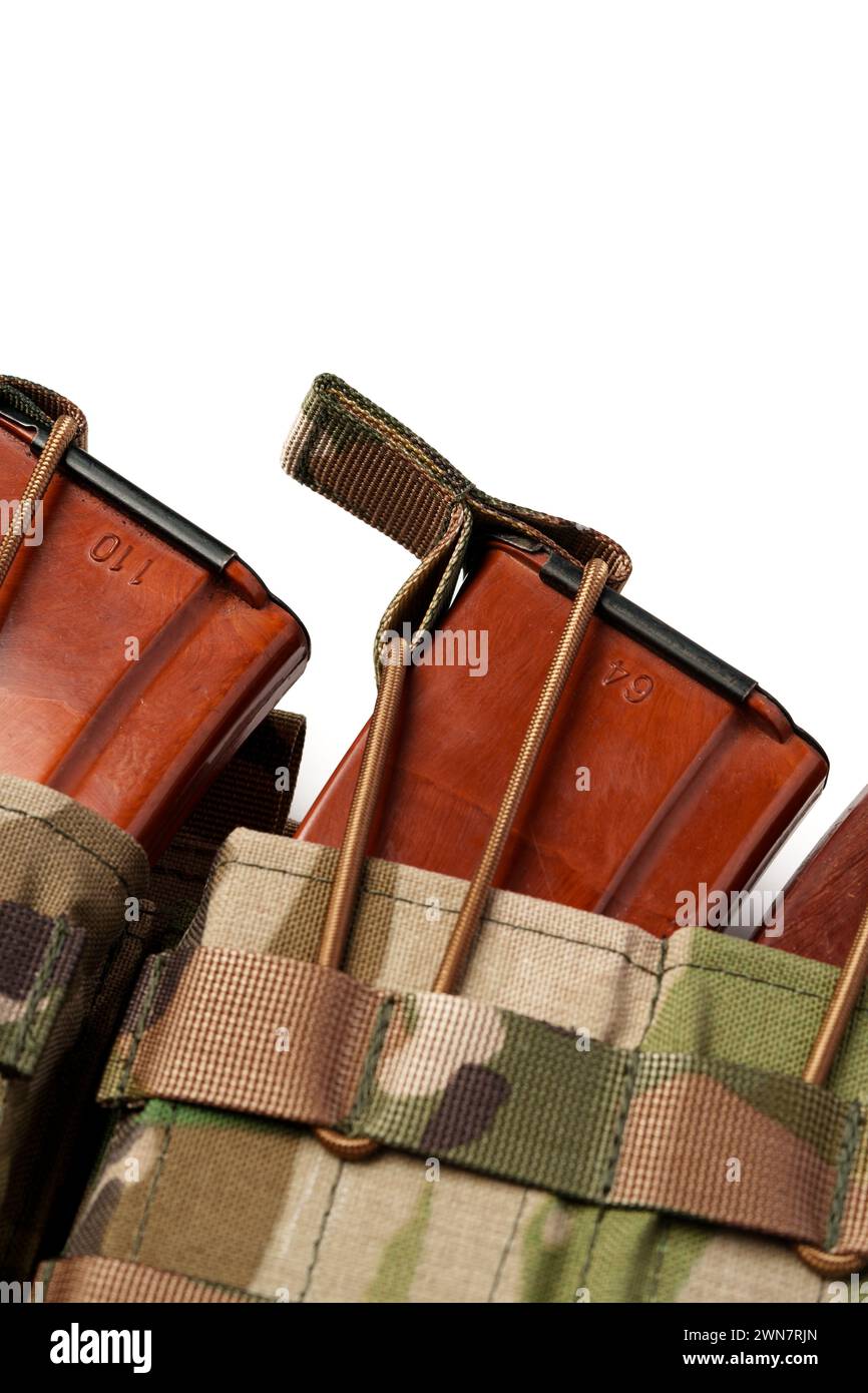 Military pouch with bullet magazines inside isolated on white ...