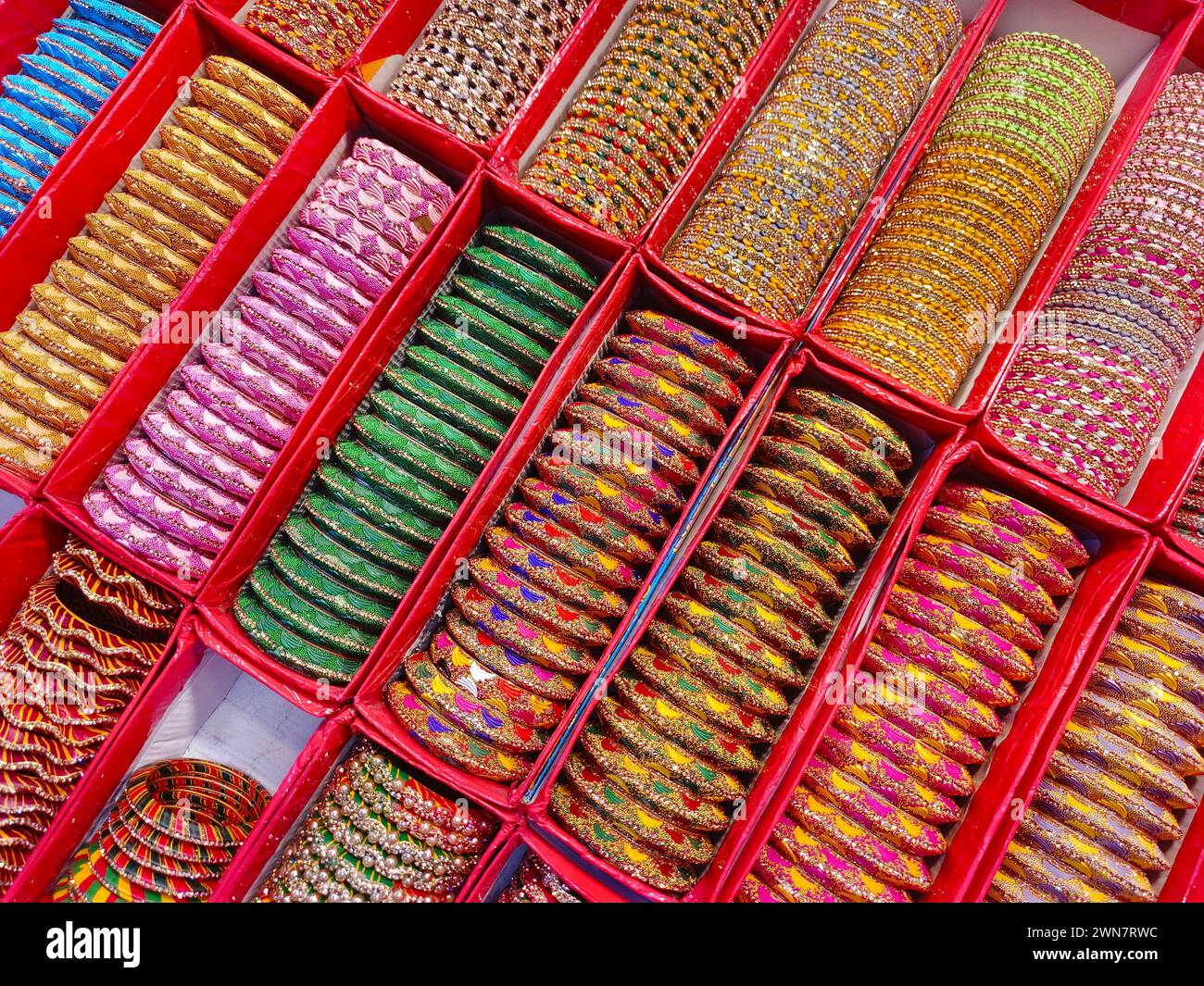 Indian colorful bangles displayed in local shop in a market of Pune ...