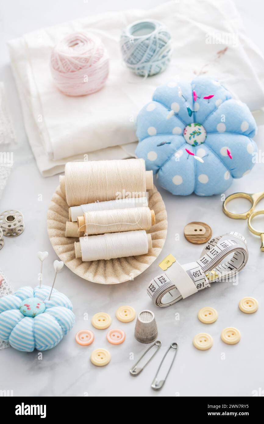Thread buttons sew threads hi-res stock photography and images - Alamy