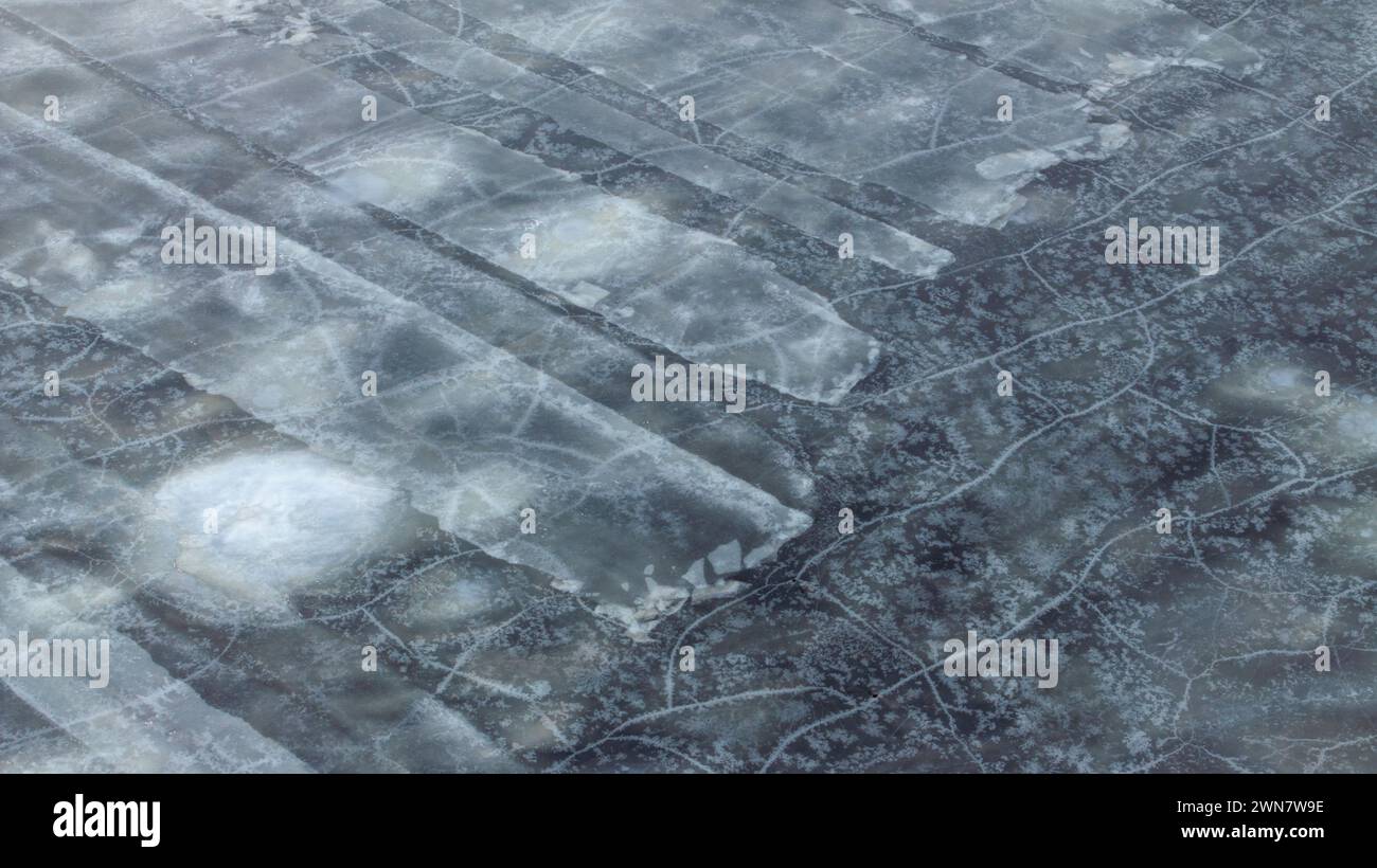Aerial top-down view to the textures and patterns of the cracked sea ...