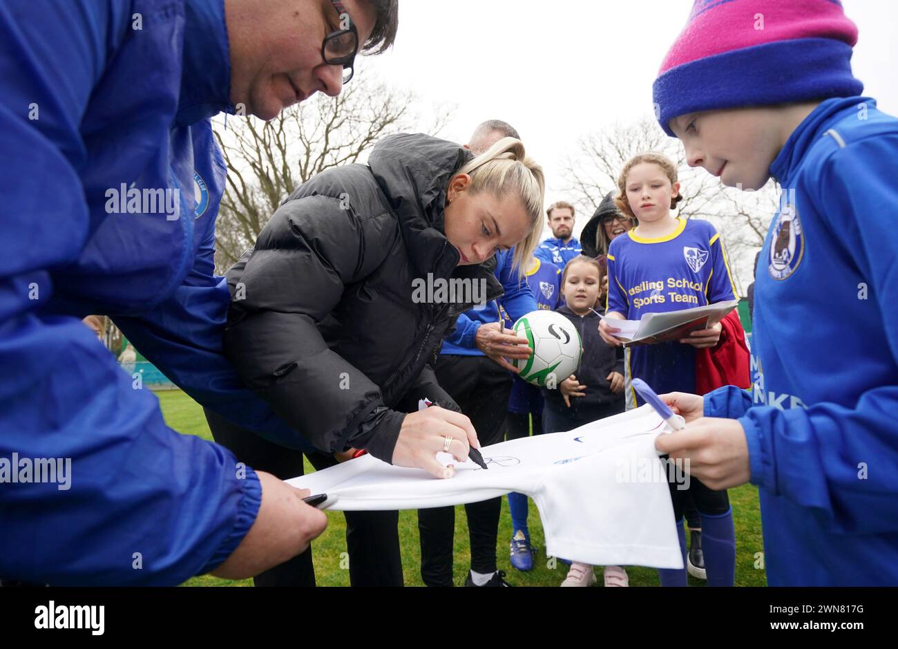 Alessia Russo signs autographs for members of the girls squads as she ...