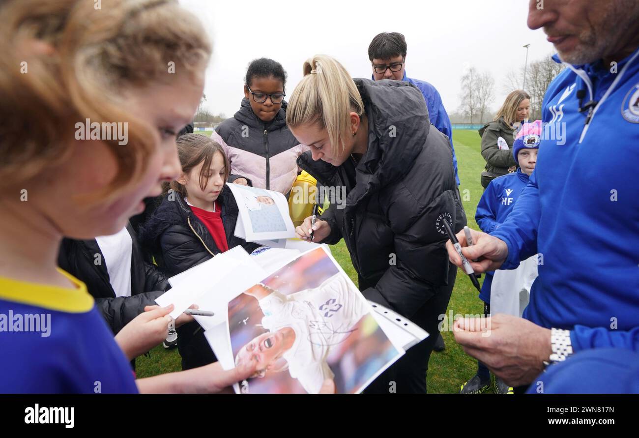Alessia Russo signs autographs for members of the girls squads as she ...