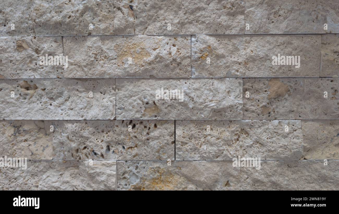 Stacked stone bricks dark grey wall background facade horizontal Stock ...