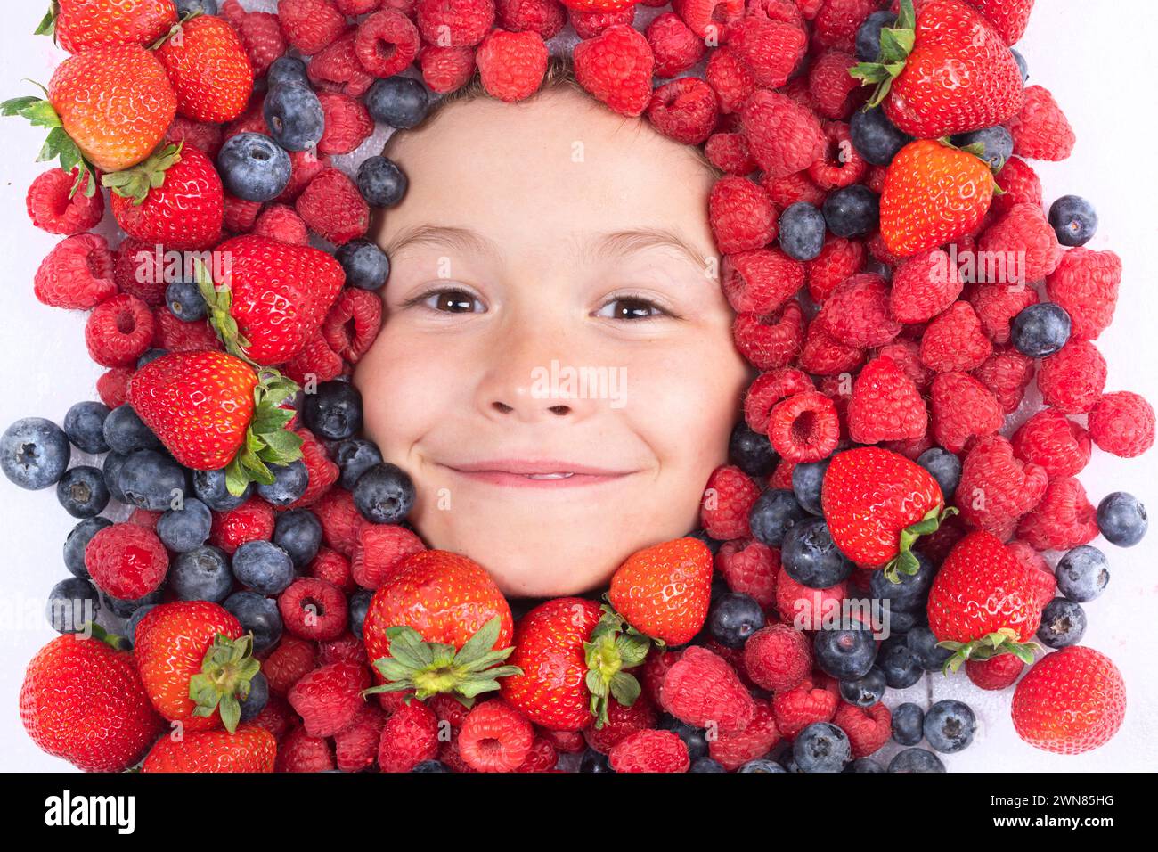 Fruits for kids. Berries mix of strawberry, blueberry, raspberry ...