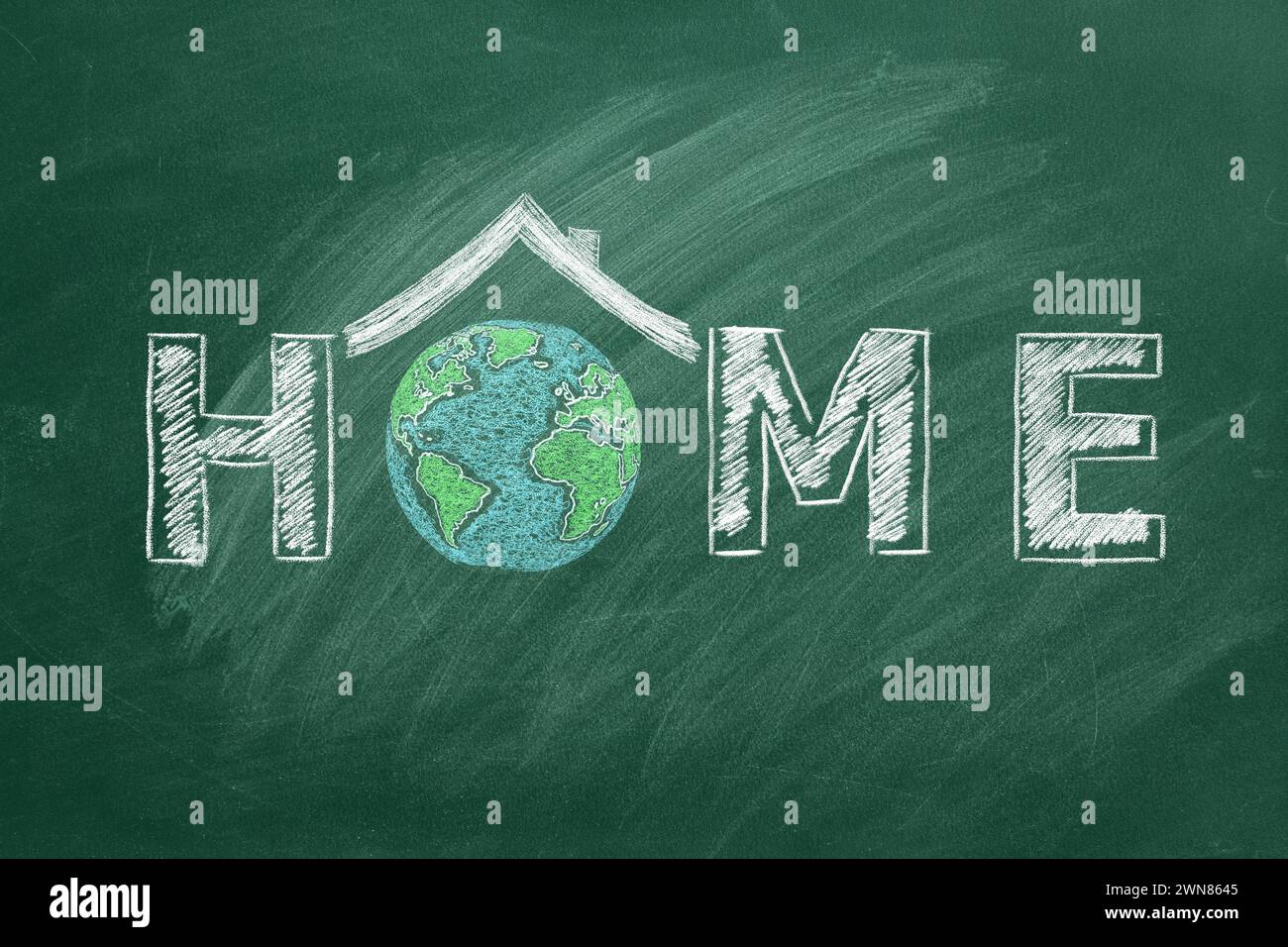 The word HOME written on a chalkboard with a house and globe symbol in ...