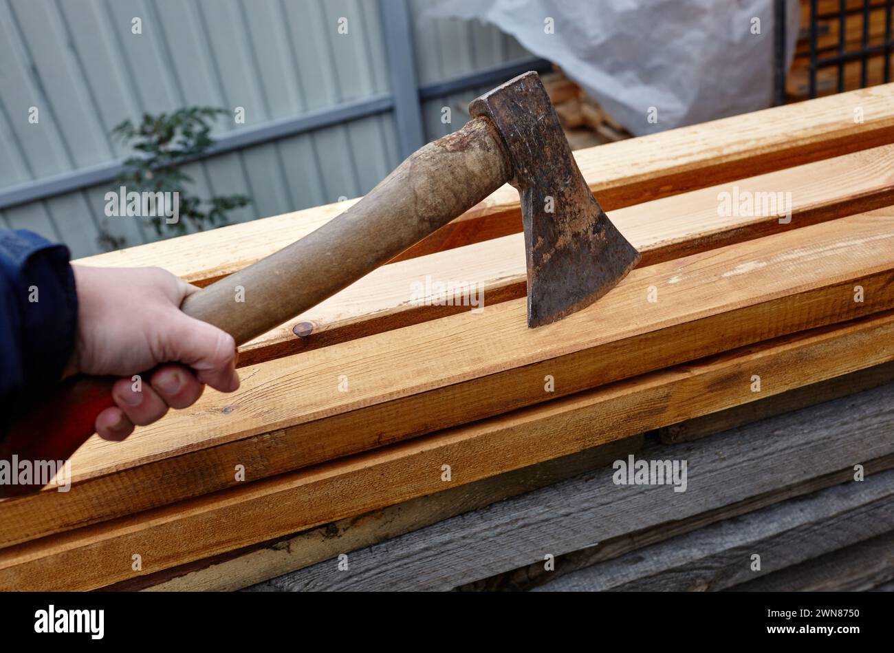 Man holding axe hi-res stock photography and images - Alamy